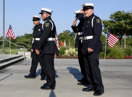 Members of the Baton Rouge Fire Department make their way - Standard News